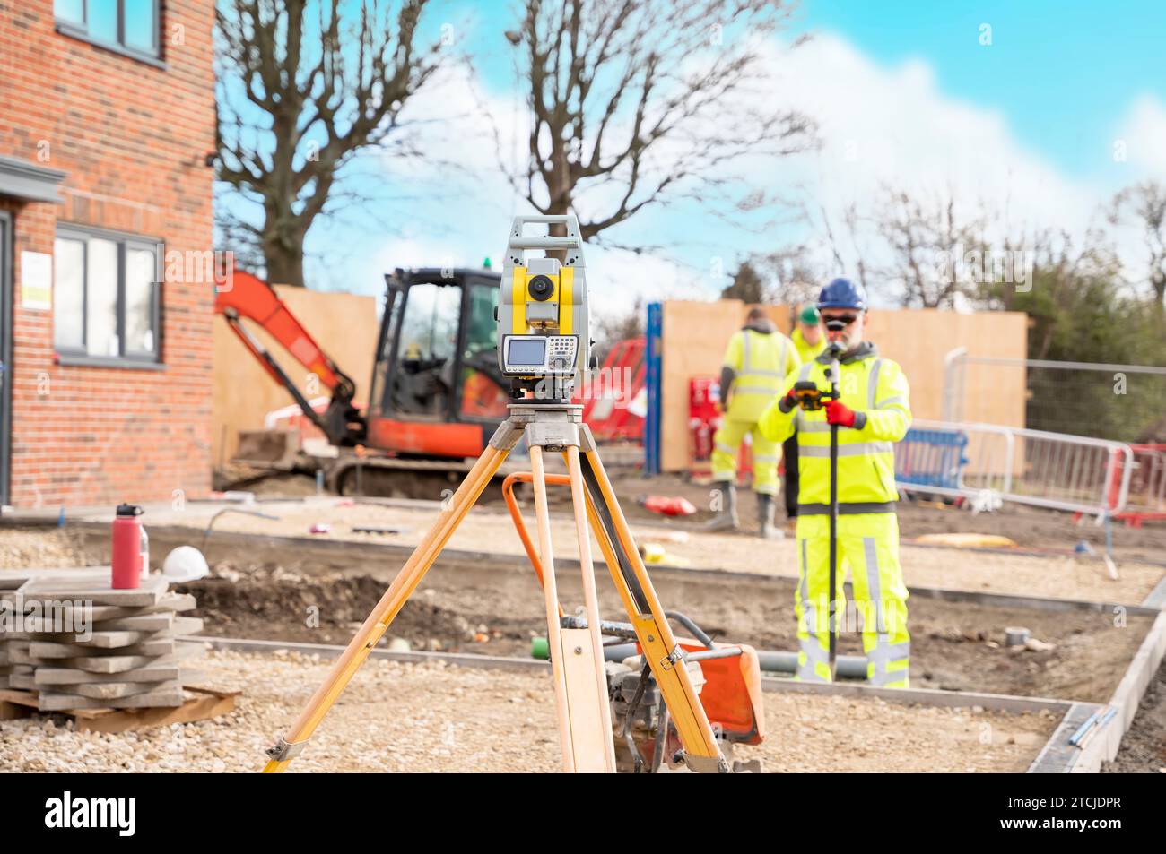 Surveyor builder site engineer with theodolite total station at ...