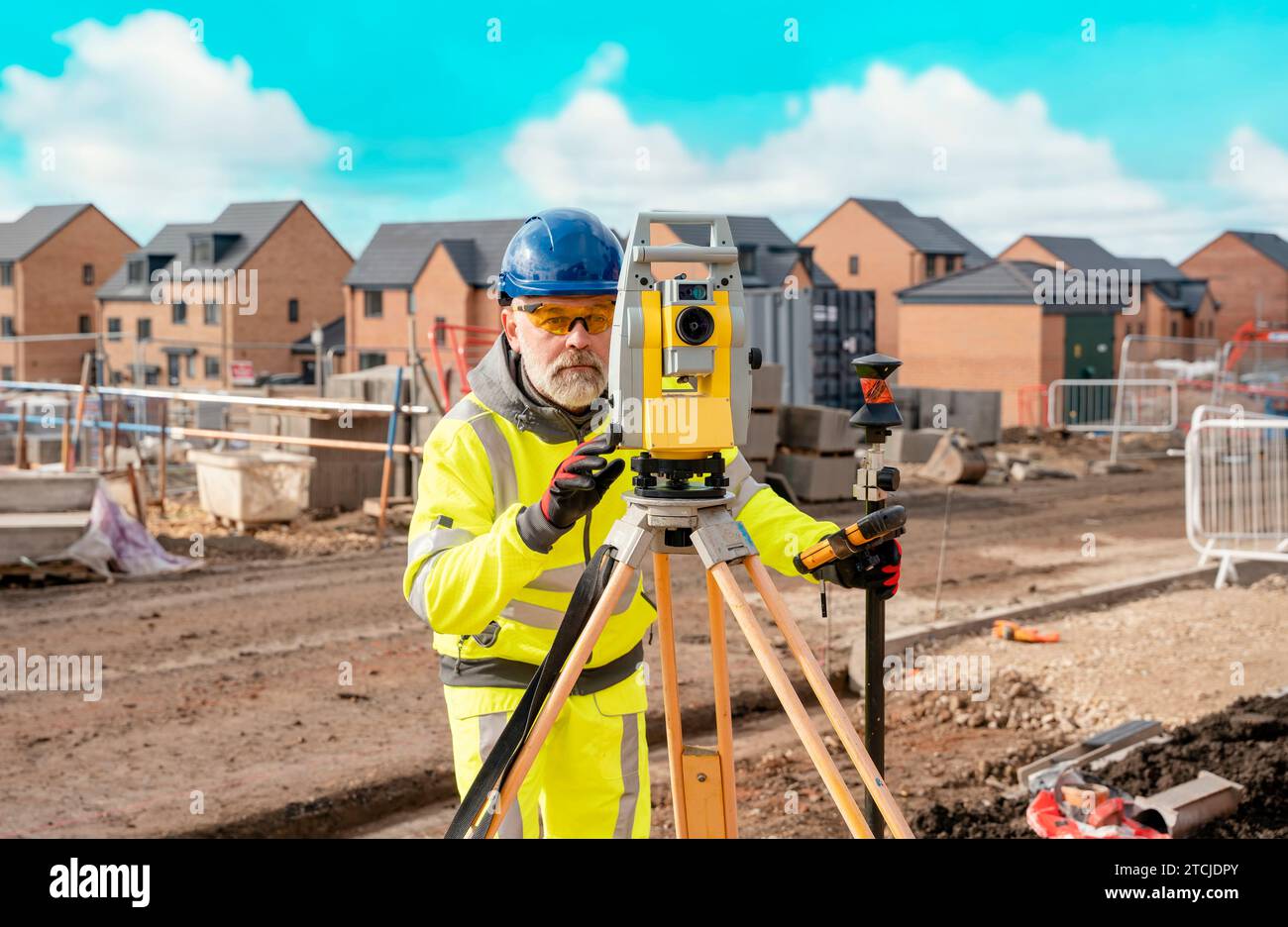 Surveyor builder site engineer with theodolite total station at ...