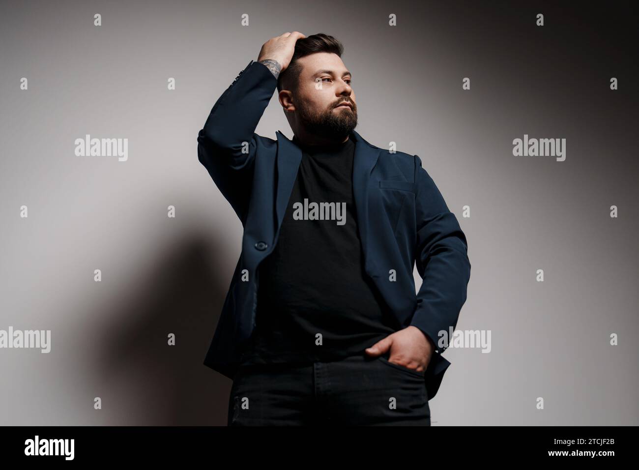 Confident Stance in Elegant Attire Stock Photo - Alamy