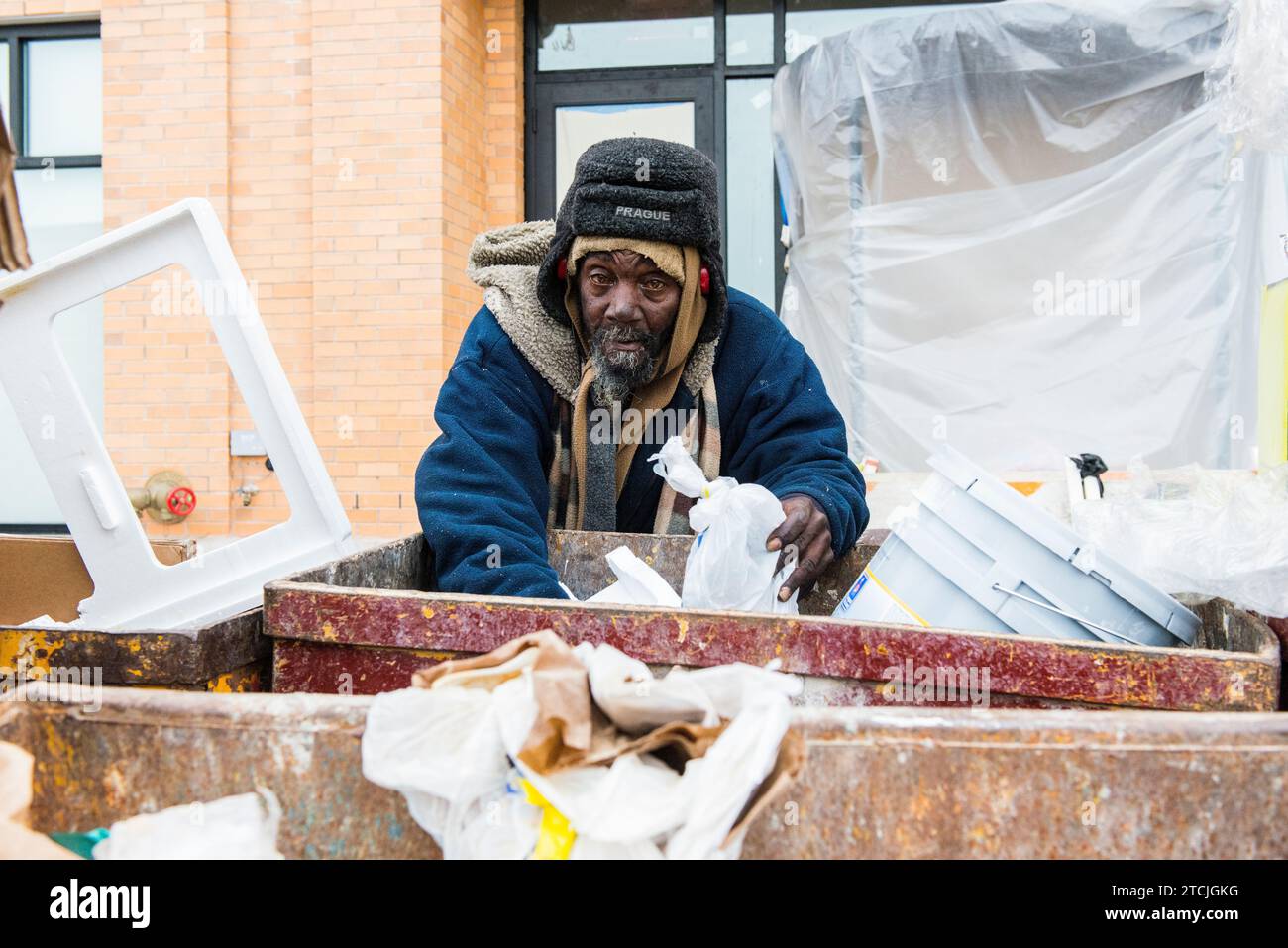 Searching a dumbster hi-res stock photography and images - Alamy