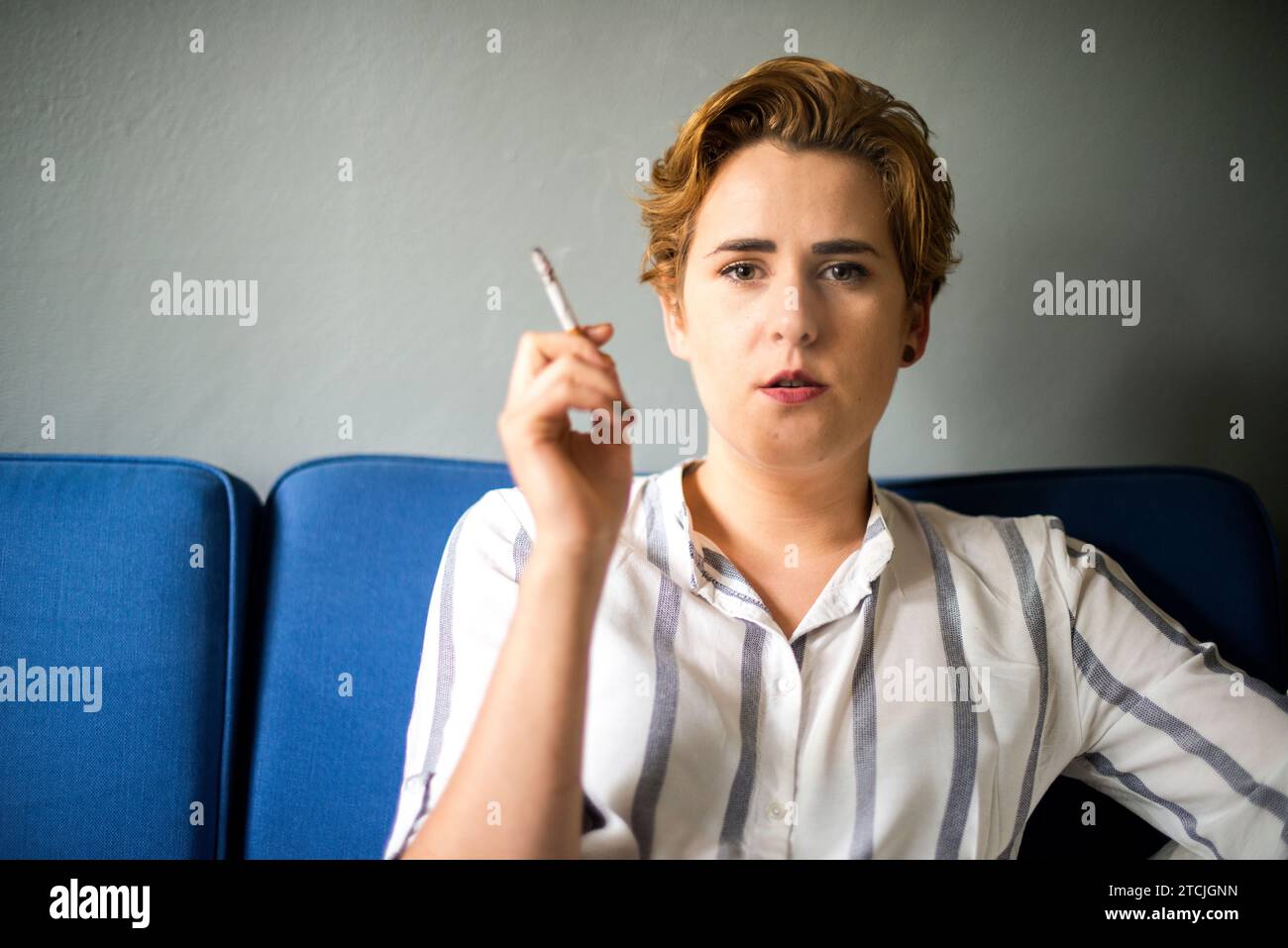 Tilburg, Netherlands. Studio portrait of a young, caucasian woman ...