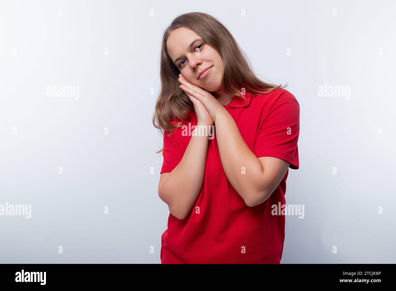 Cute teen girl smiling sweetly Stock Photo - Alamy