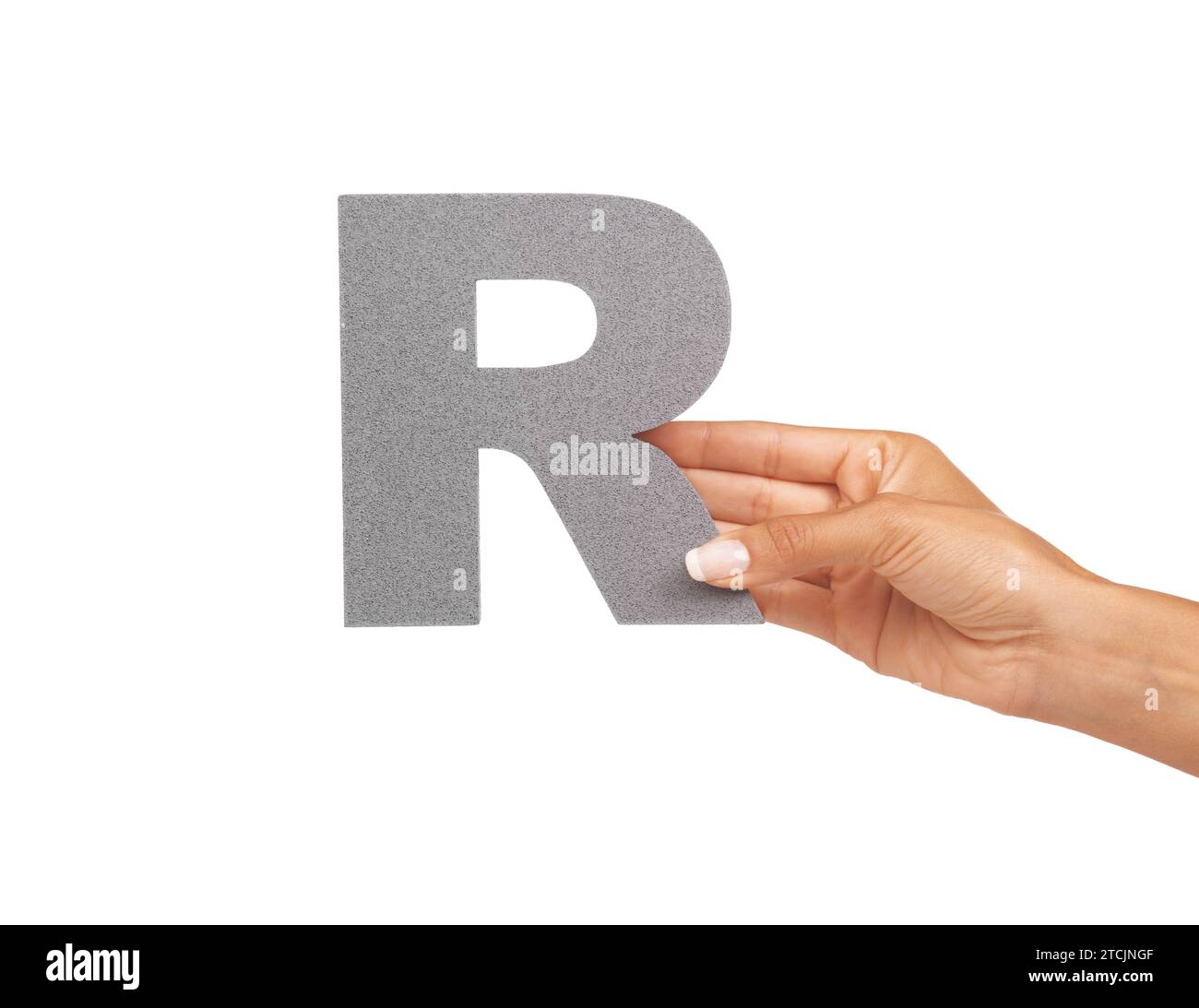 Woman, hand and letter R or alphabet in studio for advertising ...