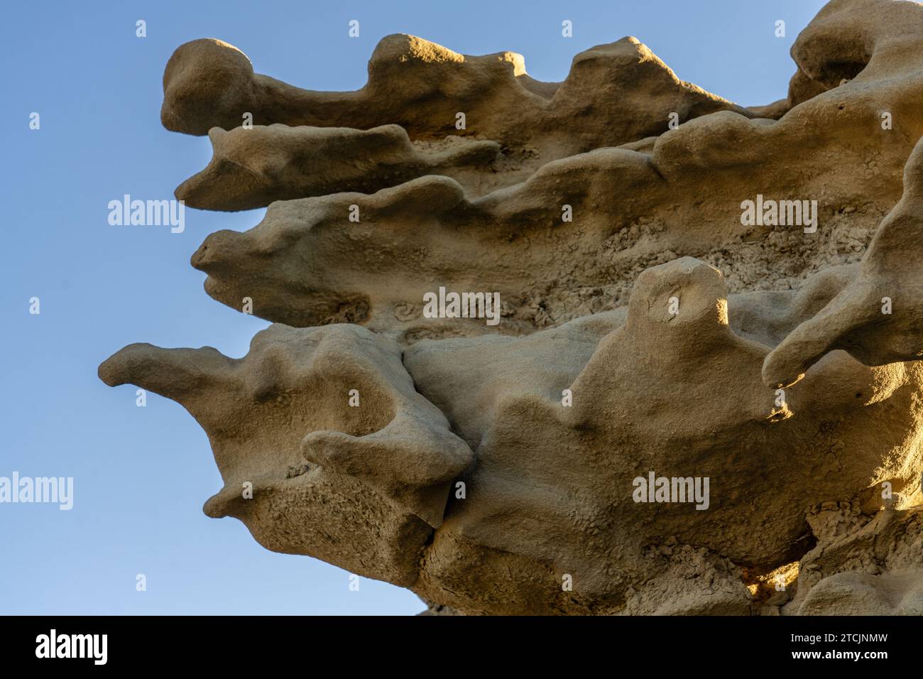 Melted wax-looking erosion patterns in the sandstone formations in ...