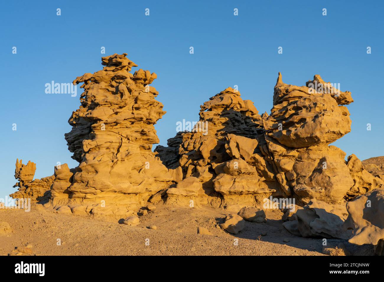 Fantastically eroded sandstone formations at sunset in the Fantasy ...