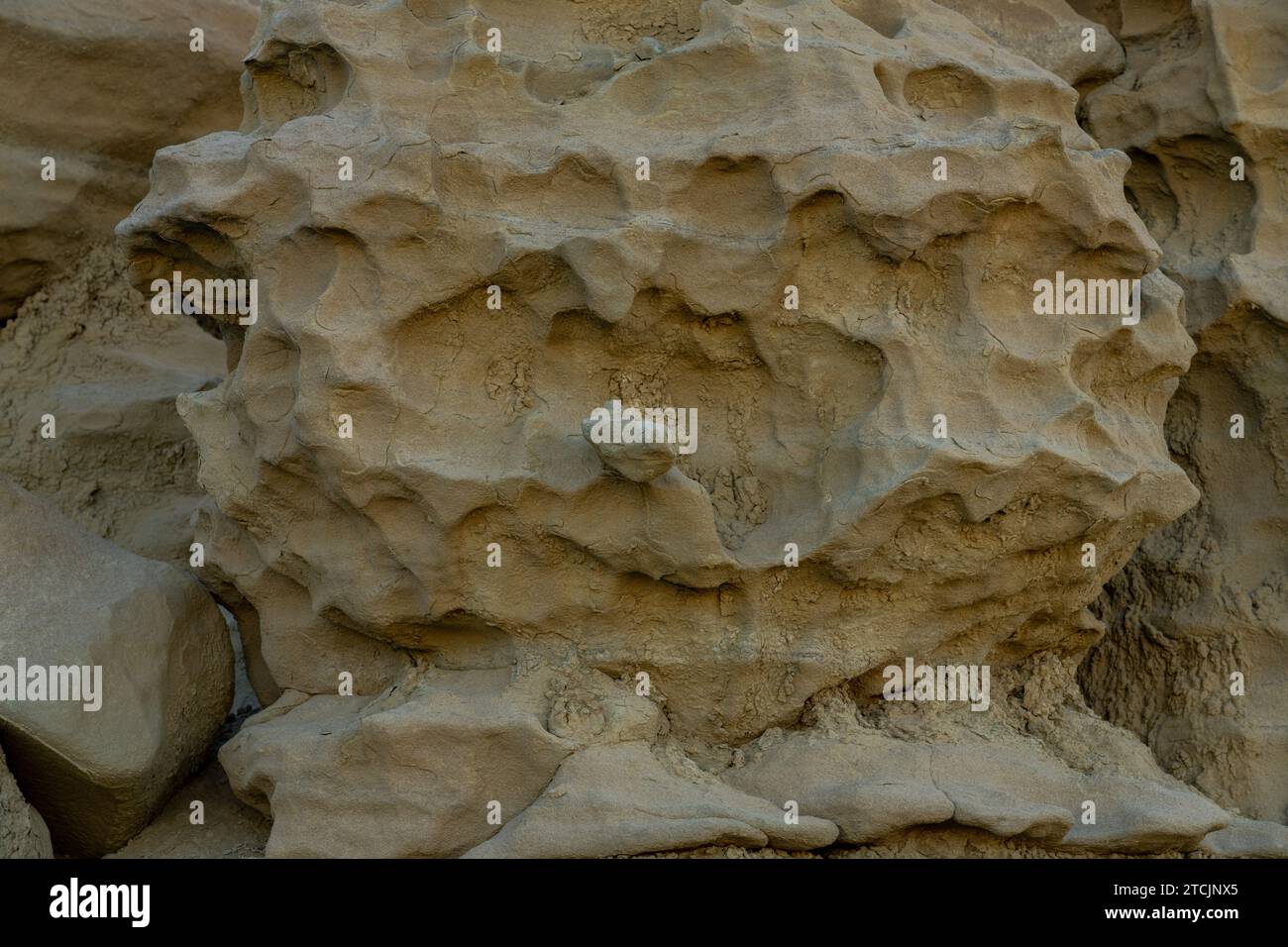 Melted wax-looking erosion patterns in the sandstone formations in ...