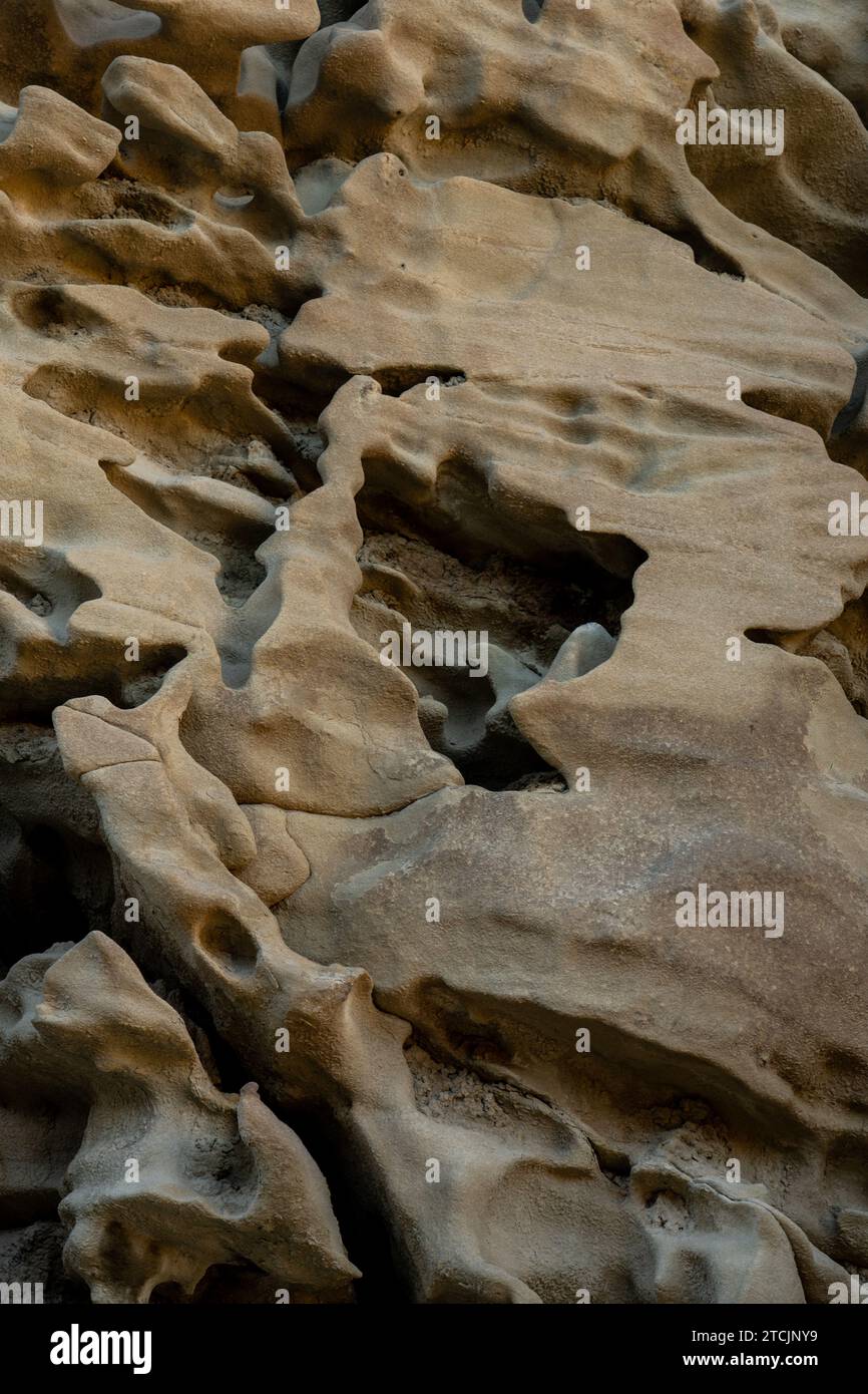 Melted wax-looking erosion patterns in the sandstone formations in ...