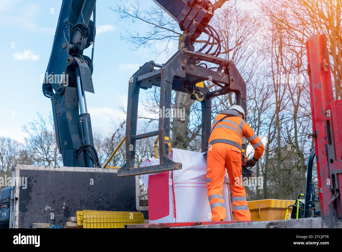 Dropside flatbed HIAB crane lorry with brick grab attachment deliver ...