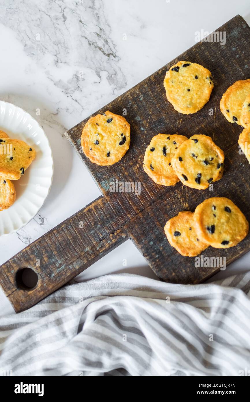 Italian style round shortbread cookies with black olives and Parmesan ...