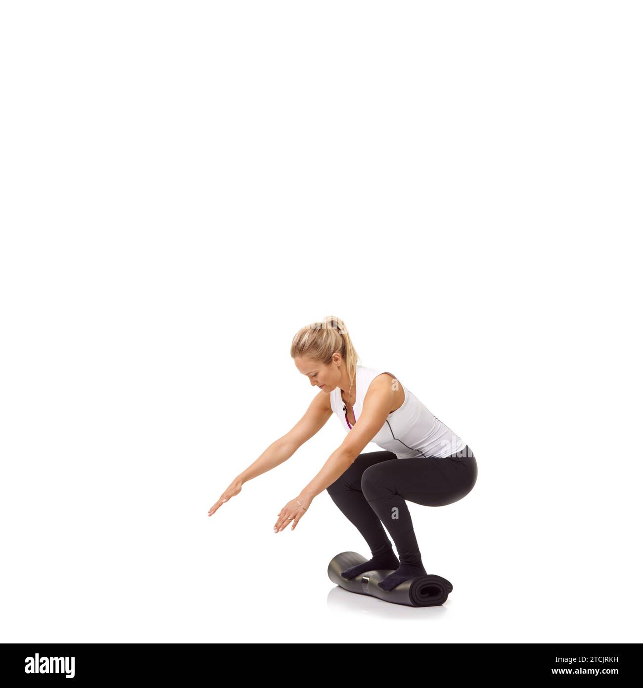 Woman, squat and workout on mat, studio profile or mockup space for ...