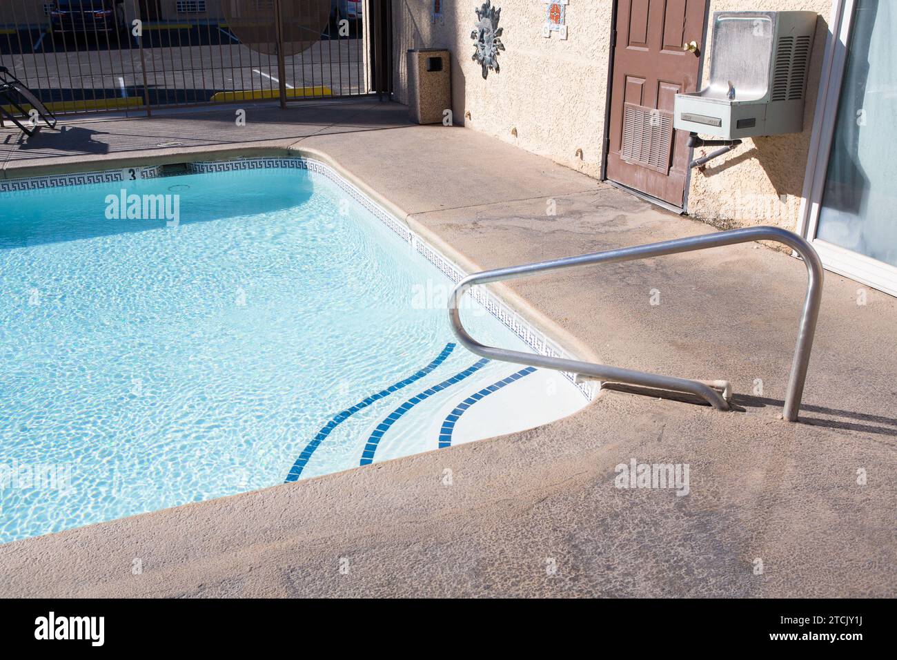 Grab bars ladder in the swimming pool, outdoor Stock Photo - Alamy