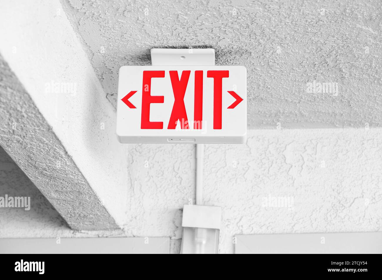 Exit sign on ceiling in the hotel Stock Photo - Alamy