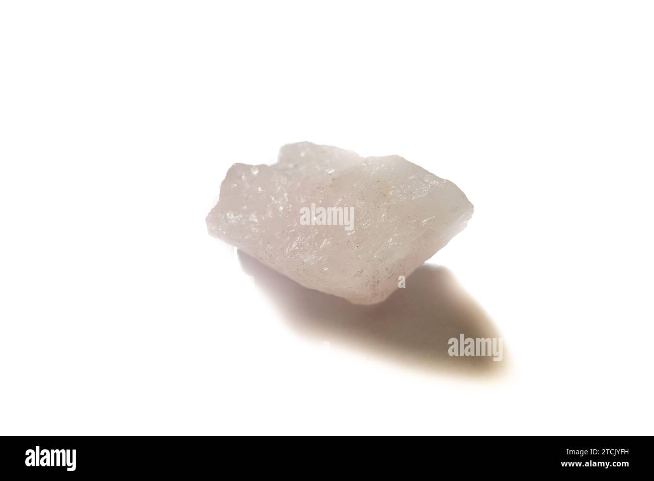 clear quartz gemstone on white background Stock Photo - Alamy