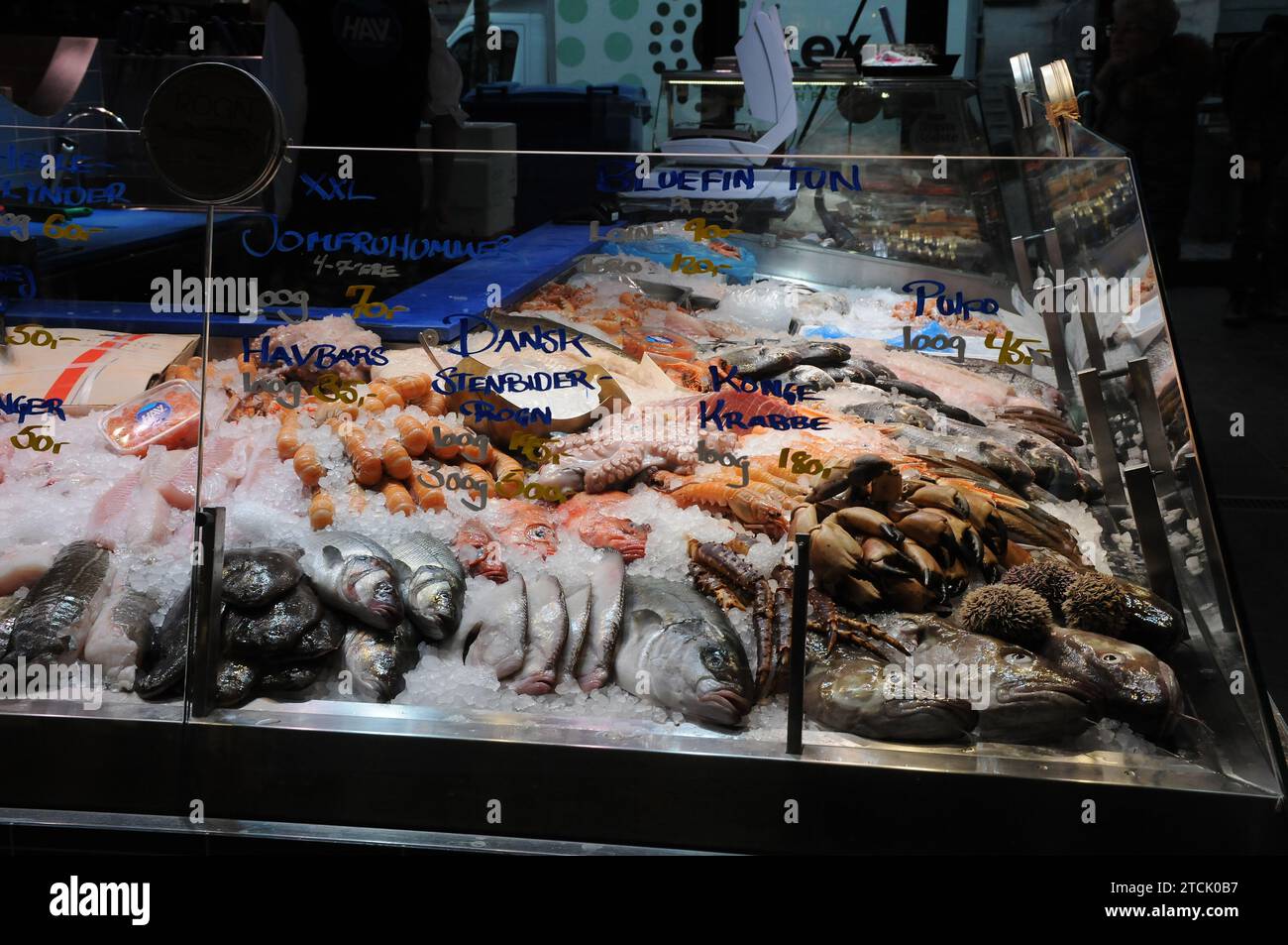 Copenhagen, Denmark /13 December 2023/.Sea food shoppers at fish shop ...