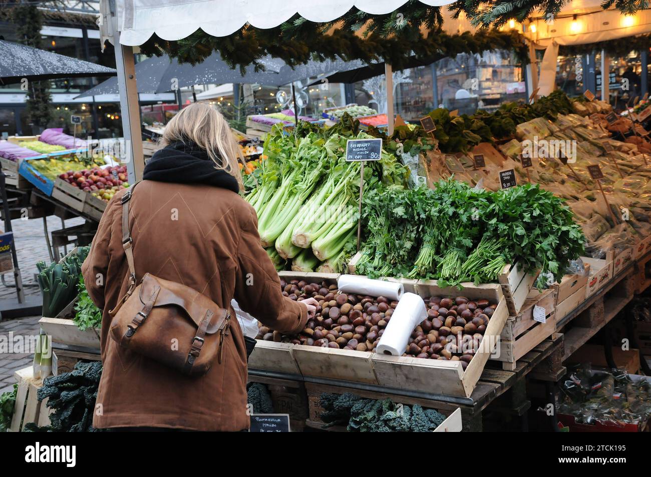 Copenhagen, Denmark /13 December 2023/Shoppers at farmers market or ...