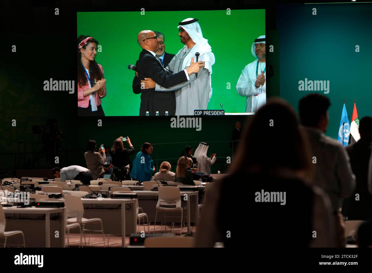 United Nations Climate Chief Simon Stiell appears onscreen as he ...