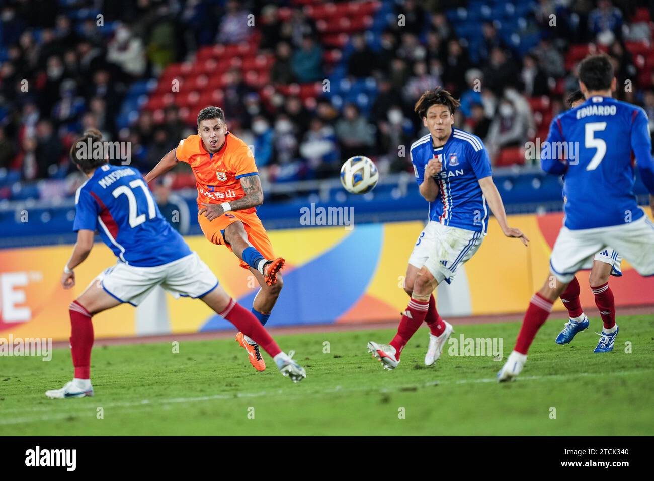Tokohama, Japan. 13th Dec, 2023. Cryzan Barcelos (2nd L) of Shandong ...