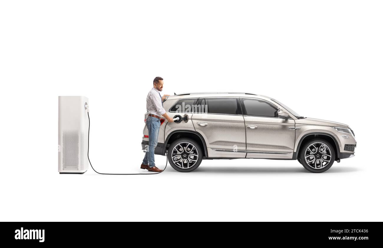Electric car owner with a SUV at a charging point isolated on white ...