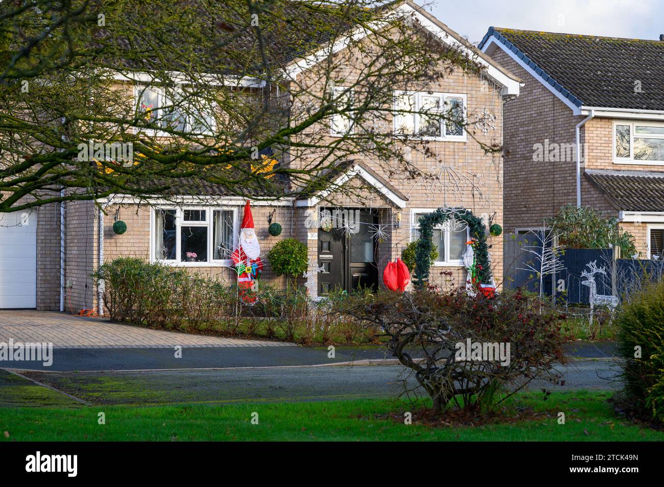 Residential property heavily decorated with Christmas decorations in ...