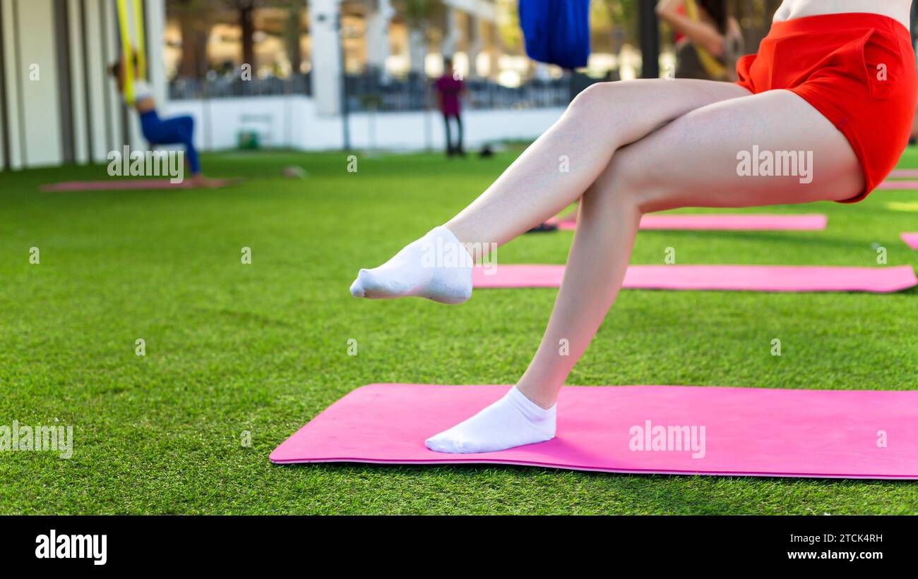 Female legs girl doing aerial gymnastics on fabric Stock Photo - Alamy