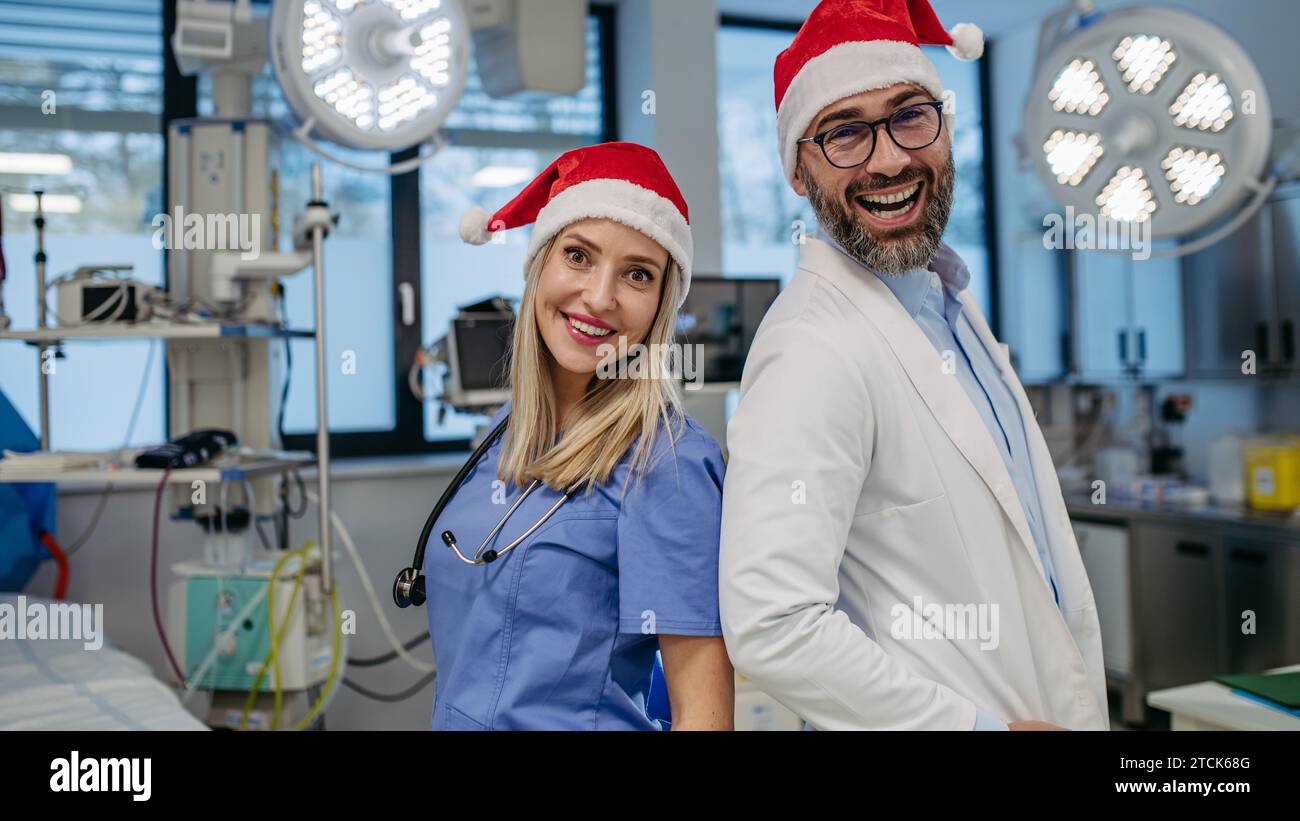 Medical emergency team during Christmas with Santa hat on head. Team of ...