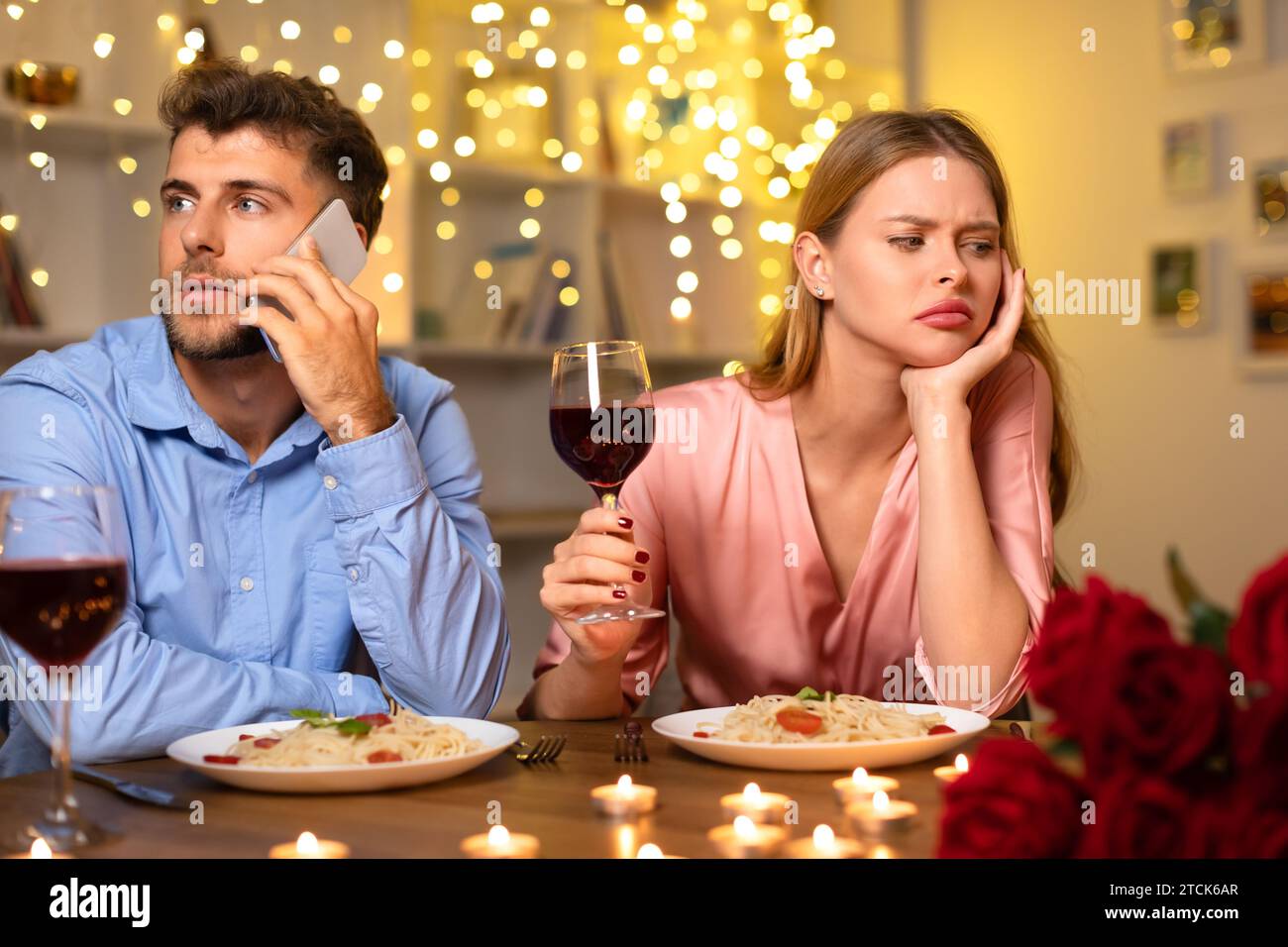 Dinner date boredom hi-res stock photography and images - Alamy