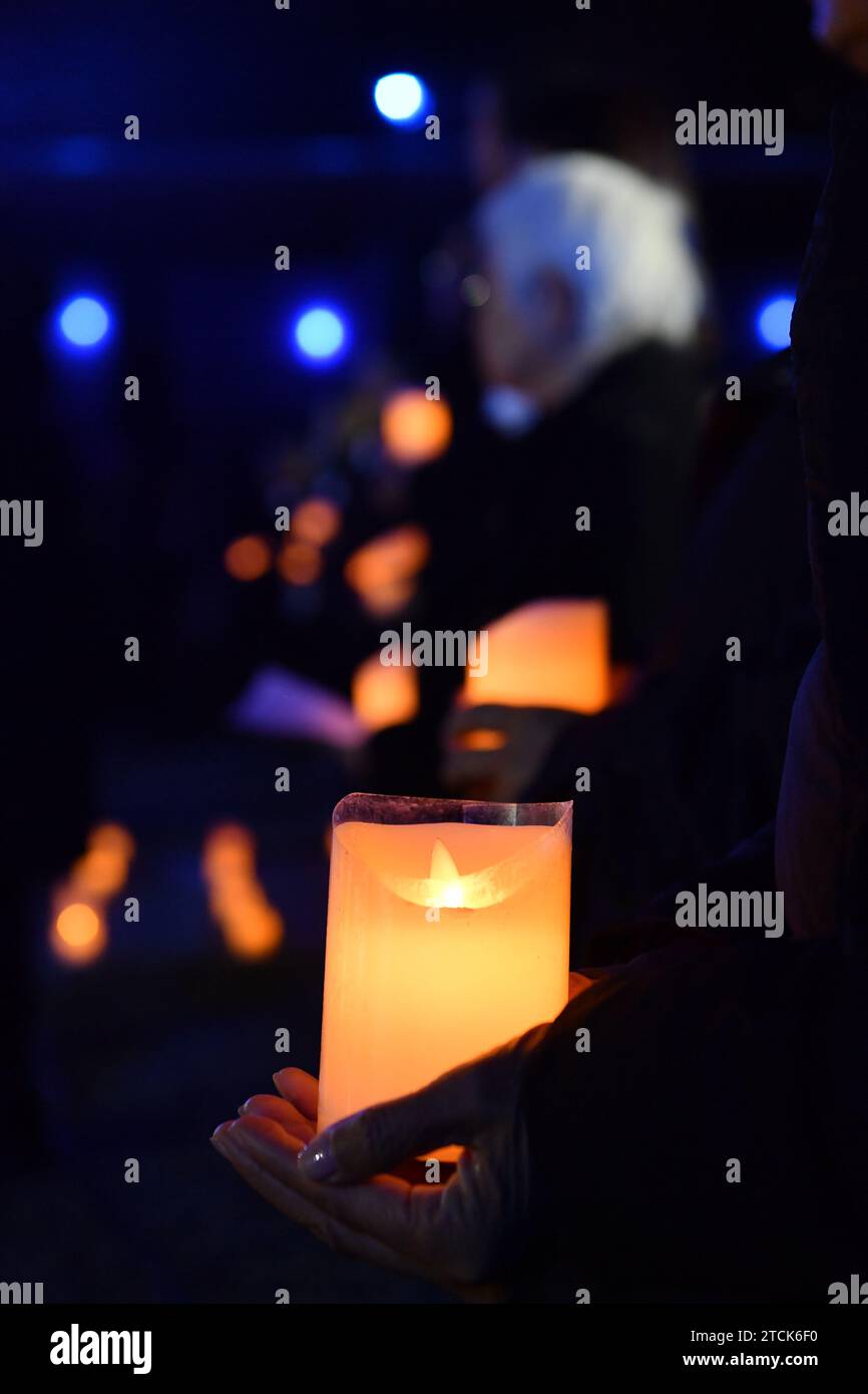 (231213) -- NANJING, Dec. 13, 2023 (Xinhua) -- People attend a candle ...