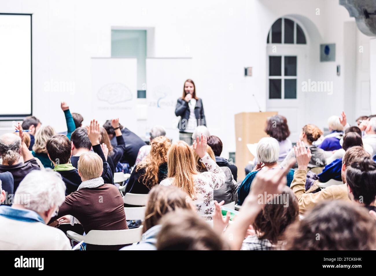 Students audience raising hands hi-res stock photography and images - Alamy