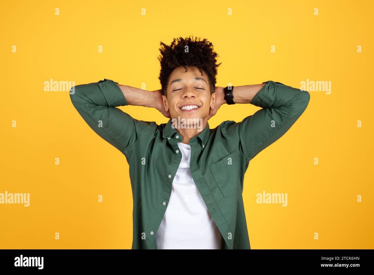 Male model arms behind head hi-res stock photography and images - Alamy