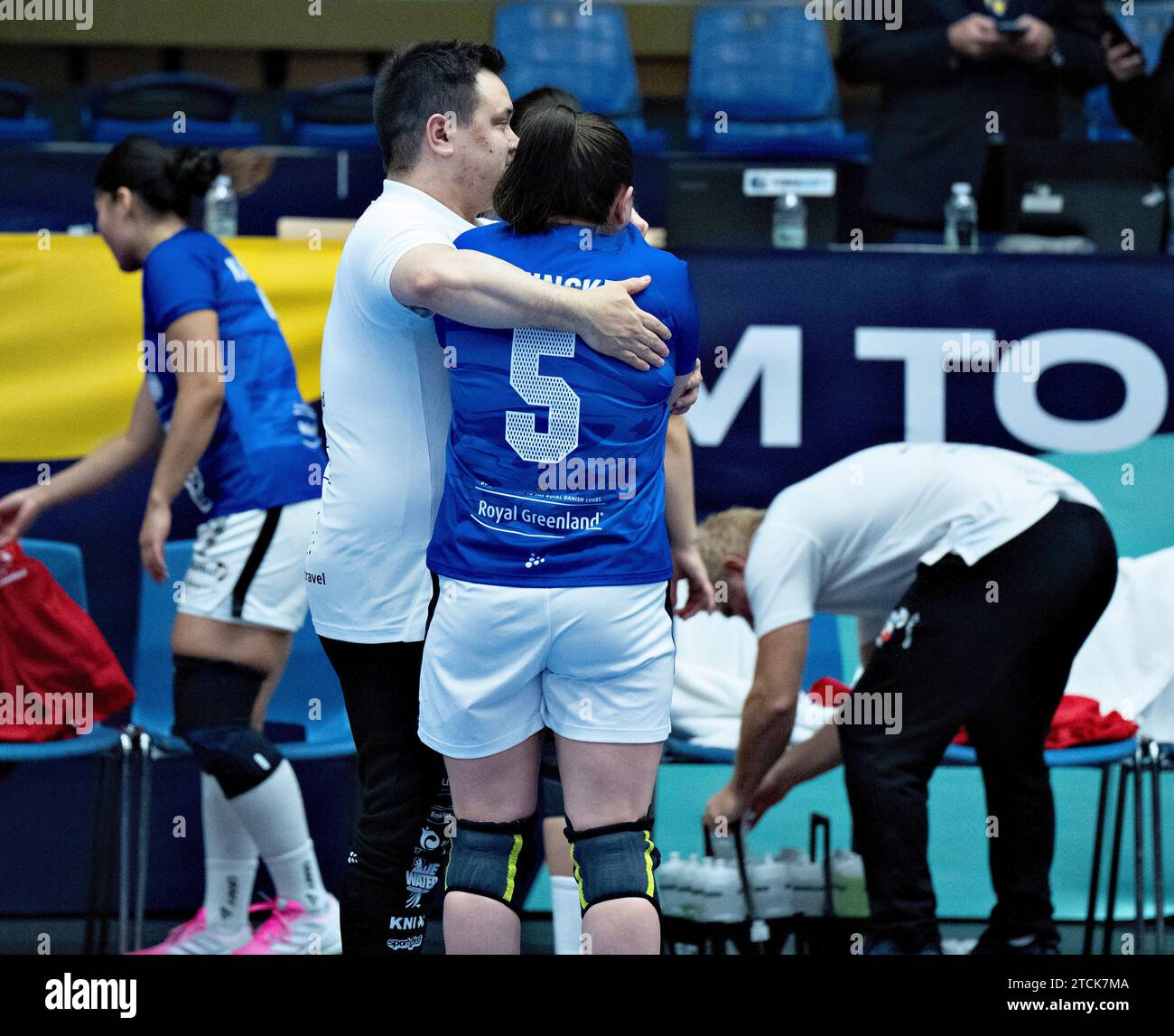 Players from Greenland reacts after losing their match between ...