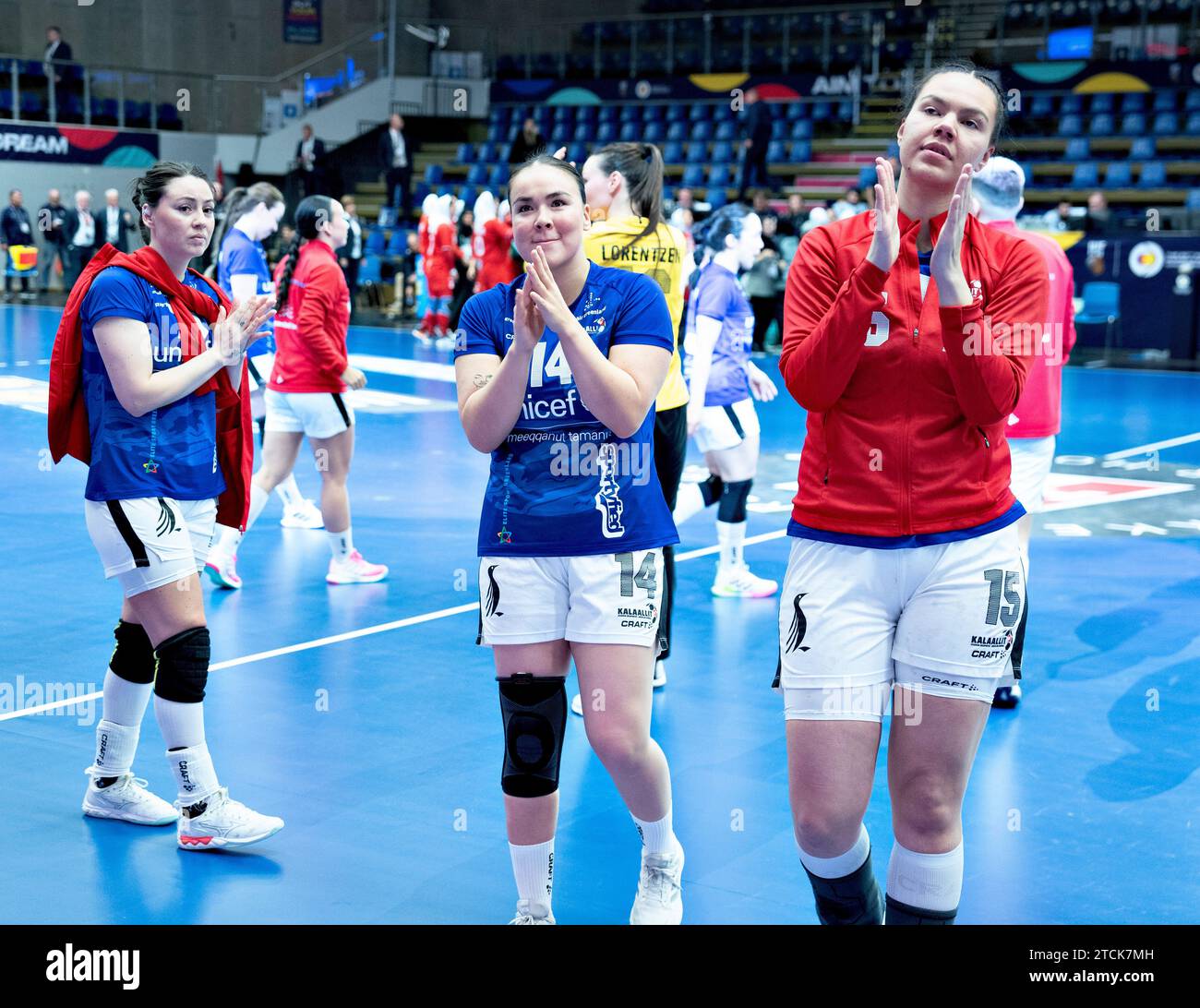Players from Greenland reacts after losing their match between ...