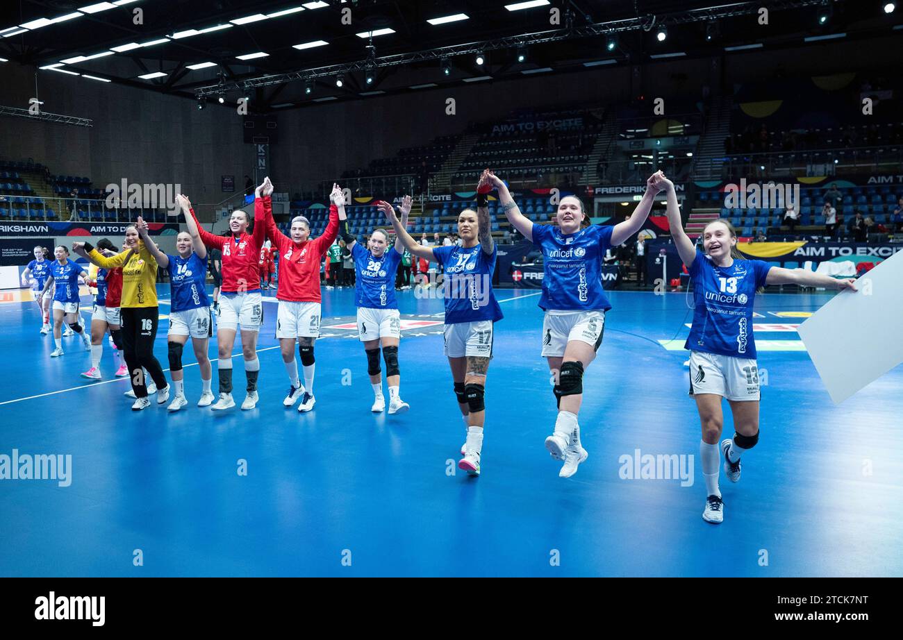 Players from Greenland reacts after losing their match between ...