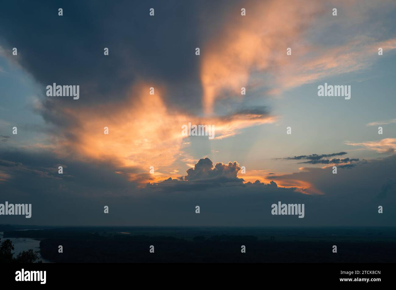 Beautiful sunset sky above with interesting shadow on the clouds from ...