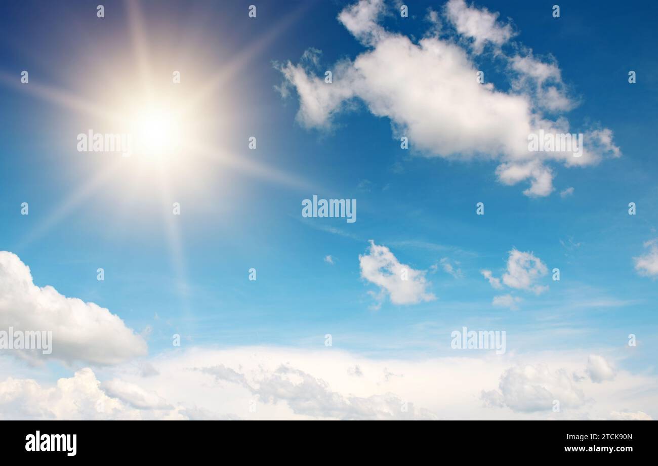 sun on beautiful blue sky Stock Photo - Alamy