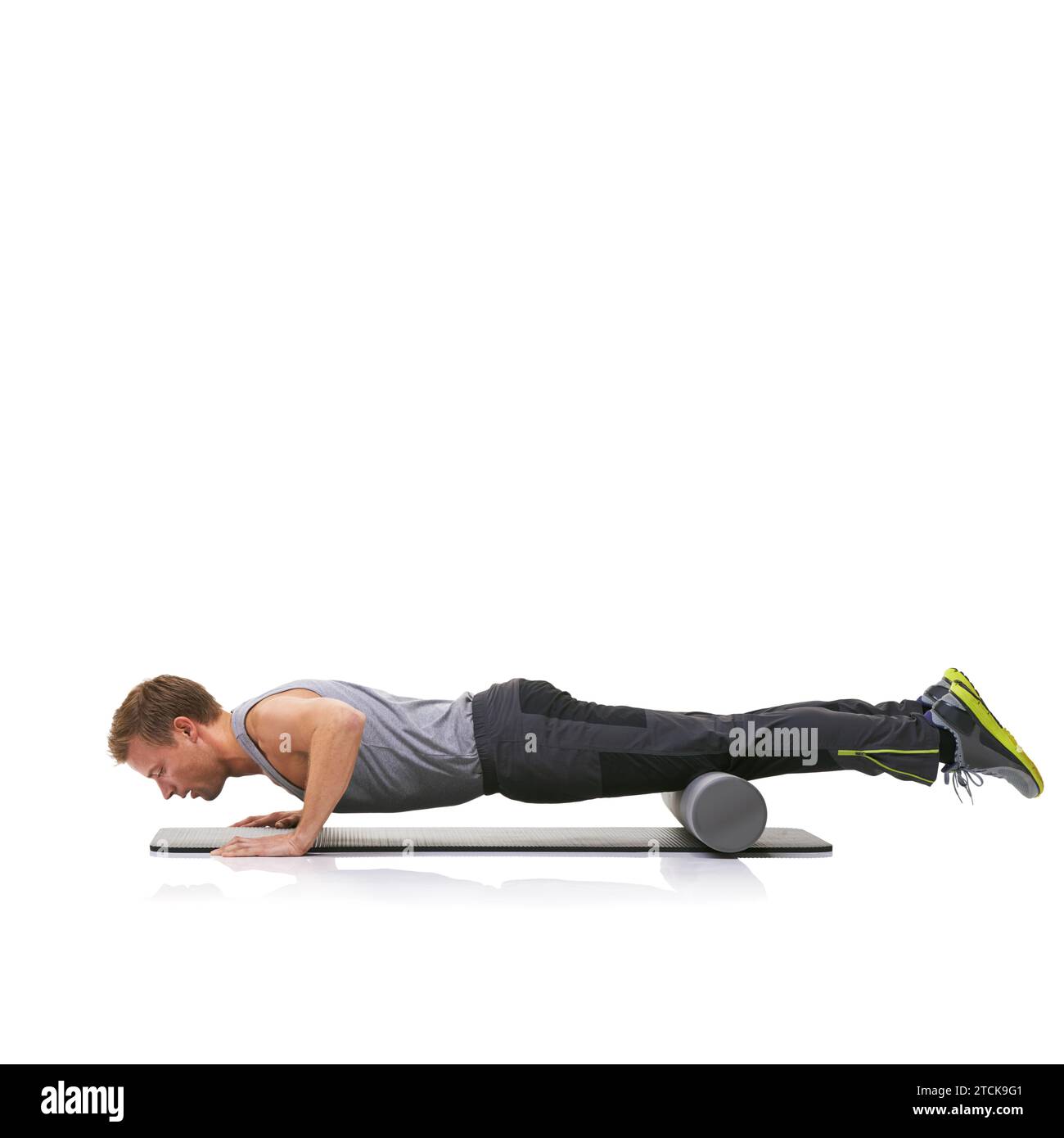 Fitness, foam roller and man in floor push up for strength building ...