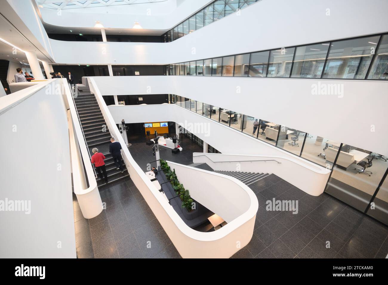 Hanover, Germany. 13th Dec, 2023. Employees walk through Continental's ...