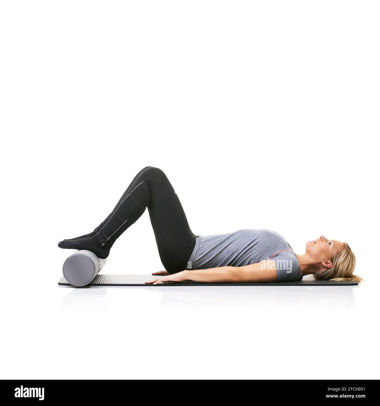 Floor exercise, foam roller and studio woman workout for active ...