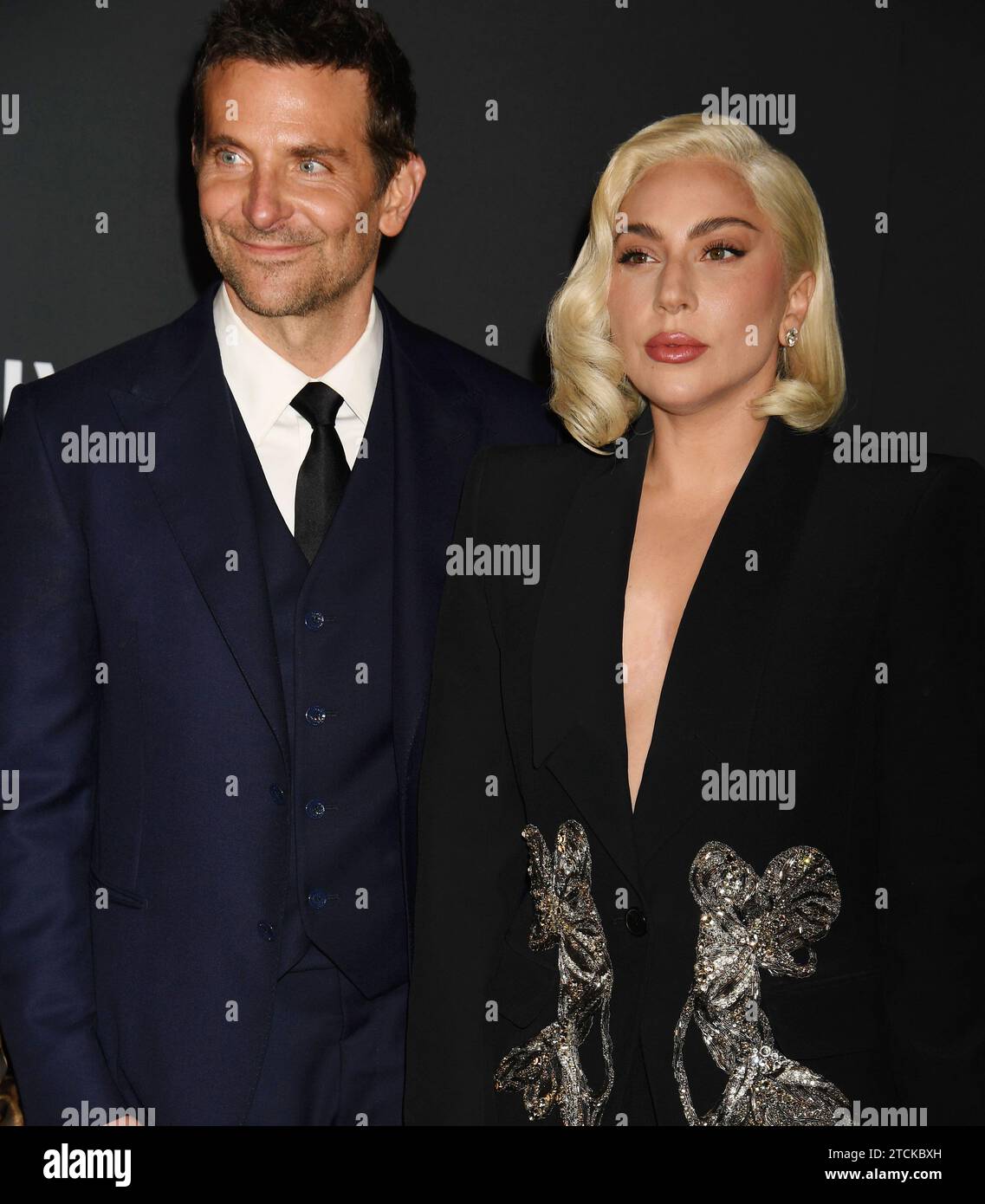 LOS ANGELES, CALIFORNIA - DECEMBER 12: (L-R) Bradley Cooper and Lady ...