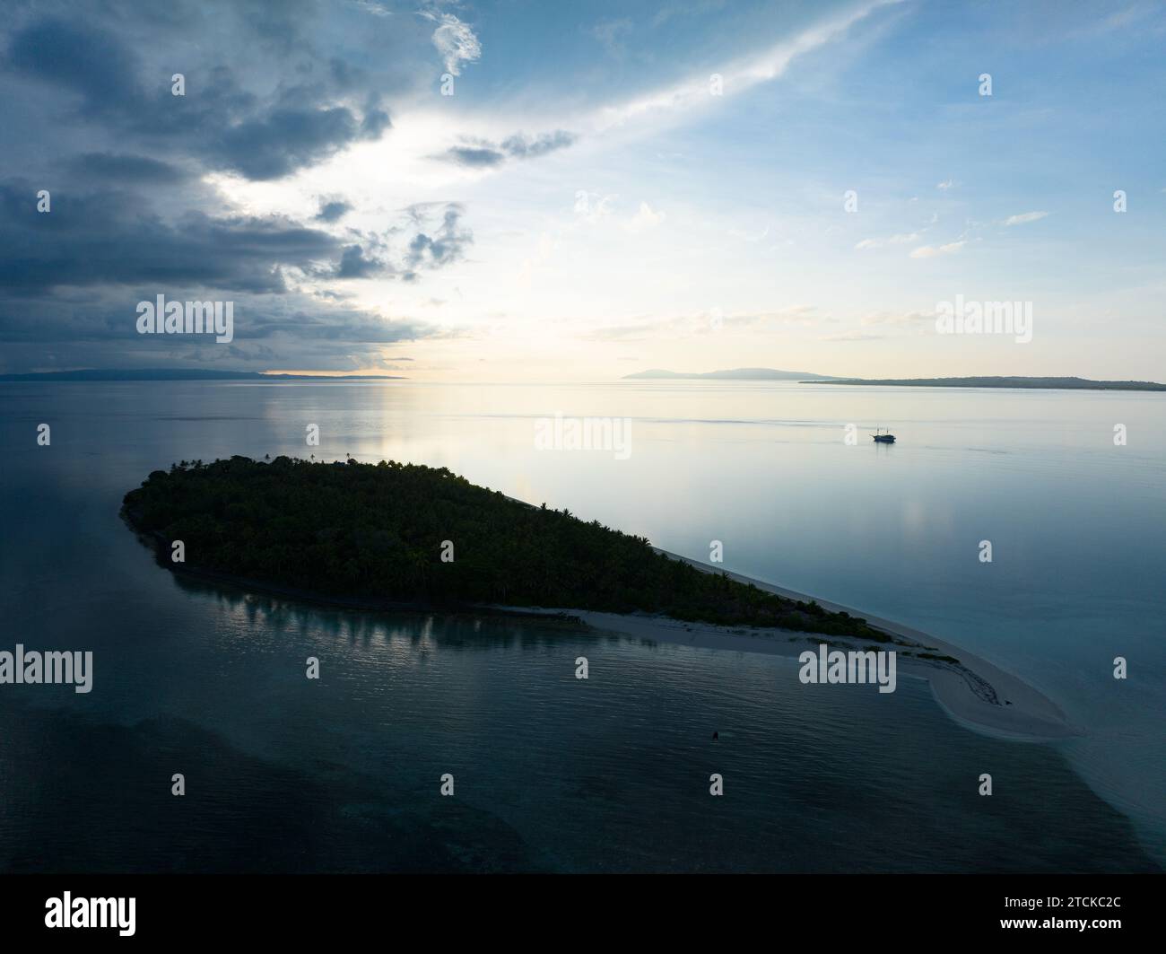 Morning light illuminates the island of Koon in Indonesia. This island ...