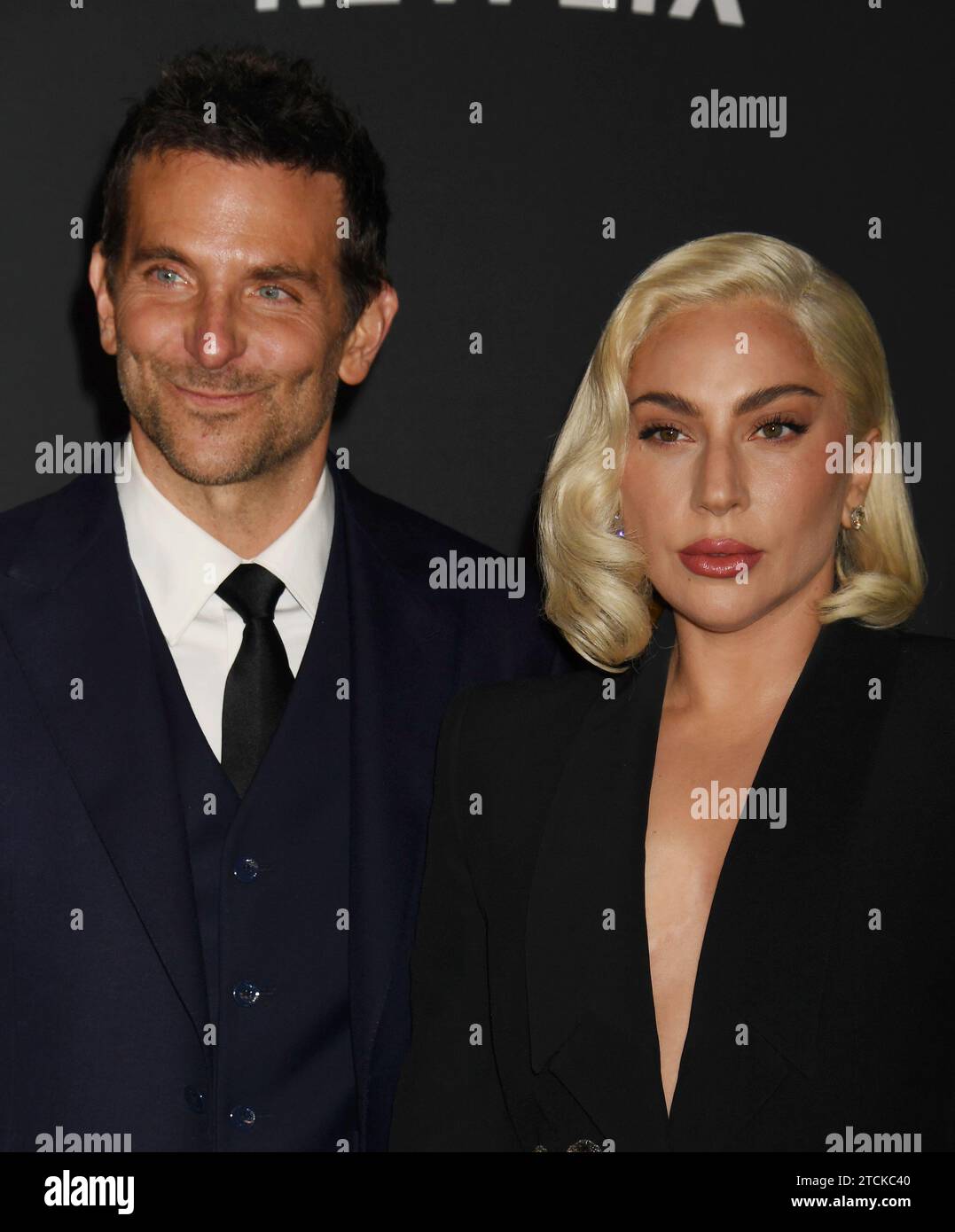 LOS ANGELES, CALIFORNIA - DECEMBER 12: (L-R) Bradley Cooper and Lady ...