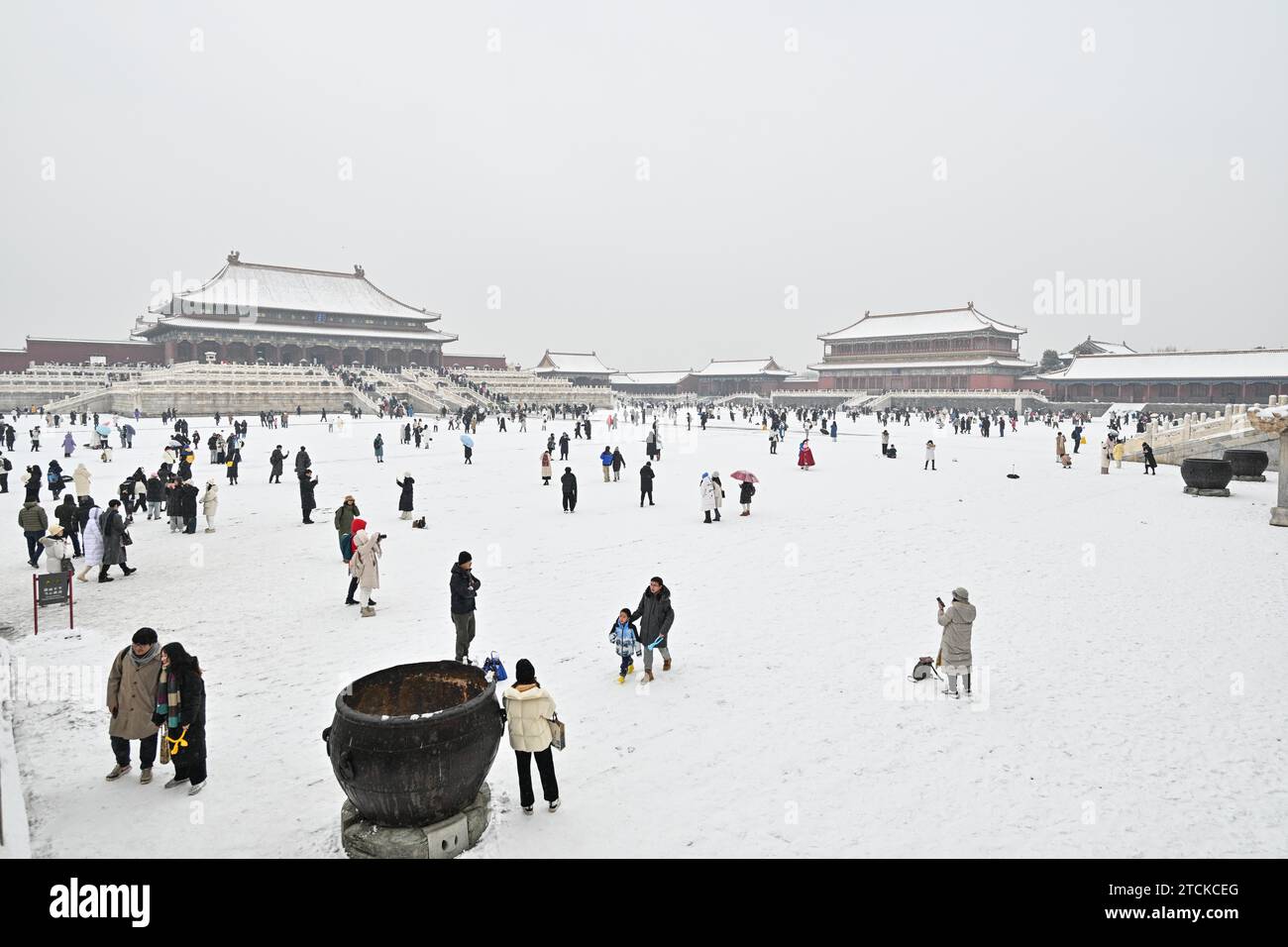 Beijing, China. 13th Dec, 2023. Tourists visit the Palace Museum in ...