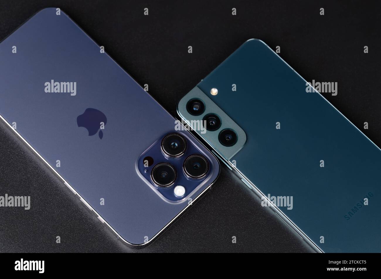 New York, USA - December 11, 2023: Iphone and samsung side to side ...