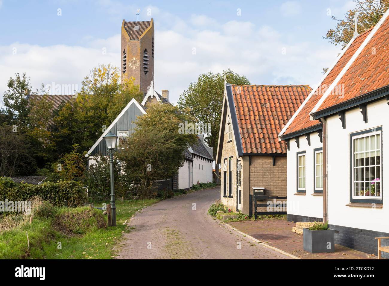 Narrow street in the smallest village on the island of Texel, De Waal ...