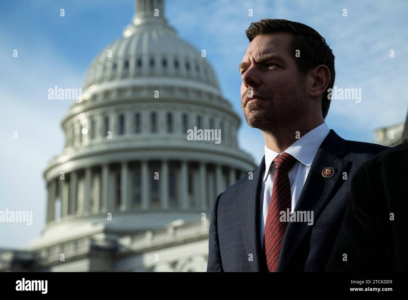 Representative Eric Swalwell (D-CA) looks on as Hunter Biden gives a ...