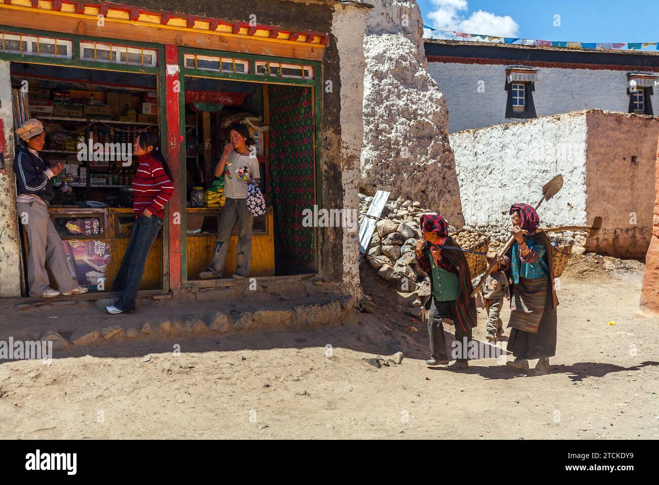 Scene of life in Shalu village, Tibet, China. People by the villege ...