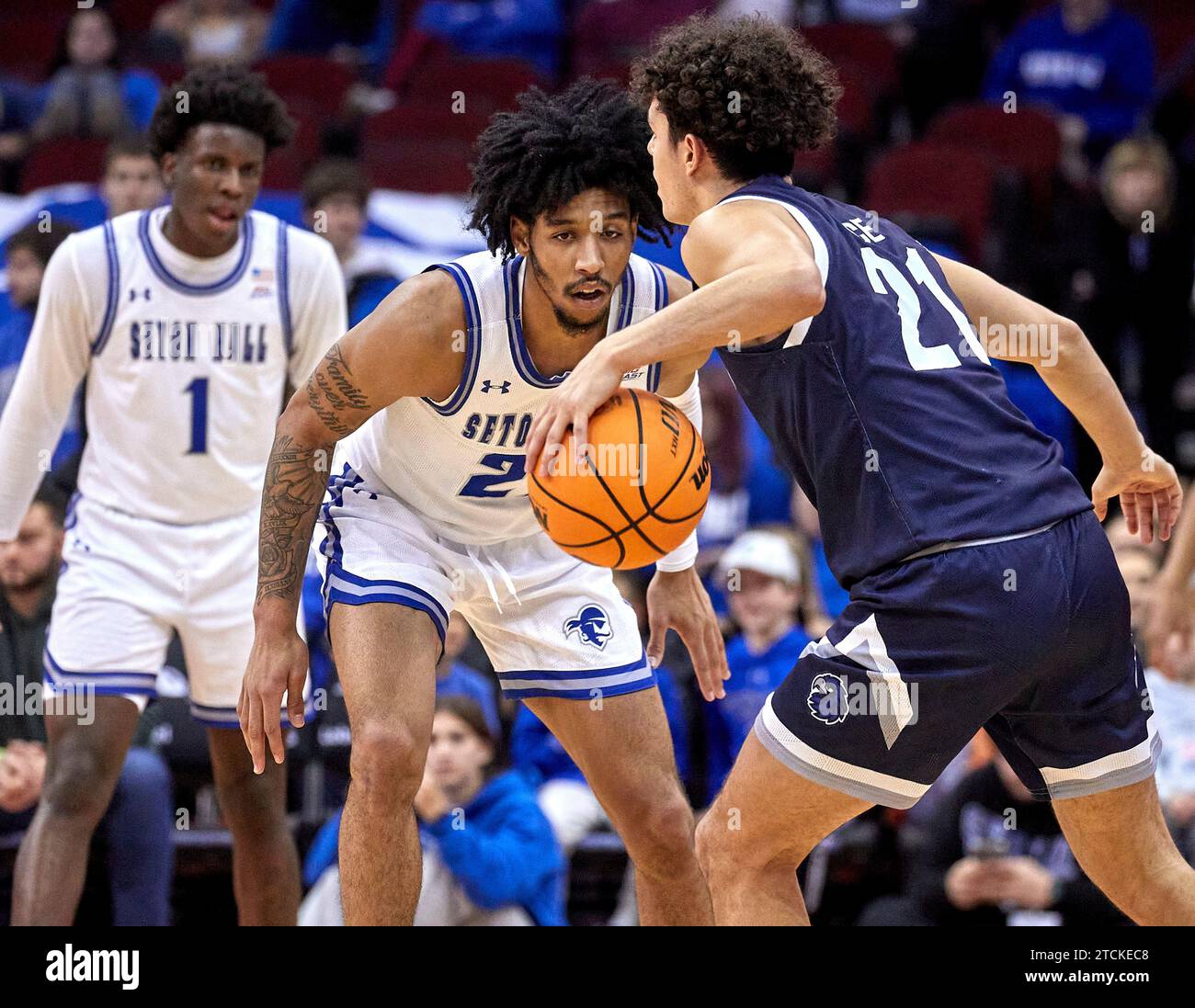 Seton Hall Pirates guard Isaiah Coleman (21) defends Monmouth Hawks ...