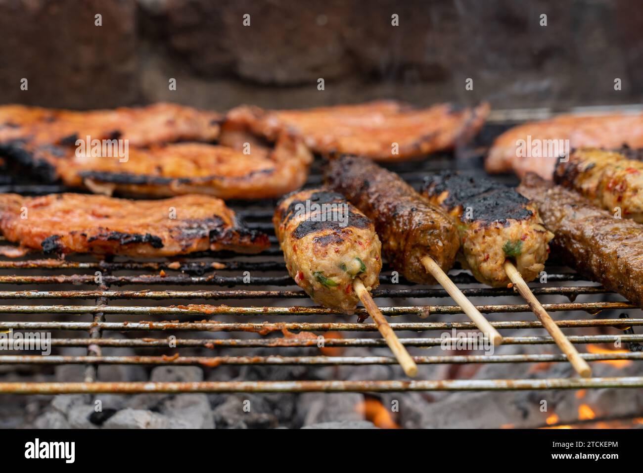 BBQ party, grilled suasage on a bbq trail, open flame Stock Photo - Alamy