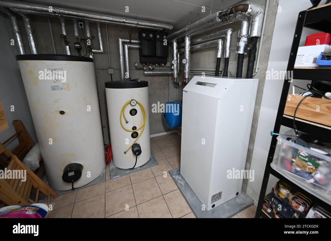Munich, Germany. 13th Dec, 2023. A water-to-water heat pump with a well ...
