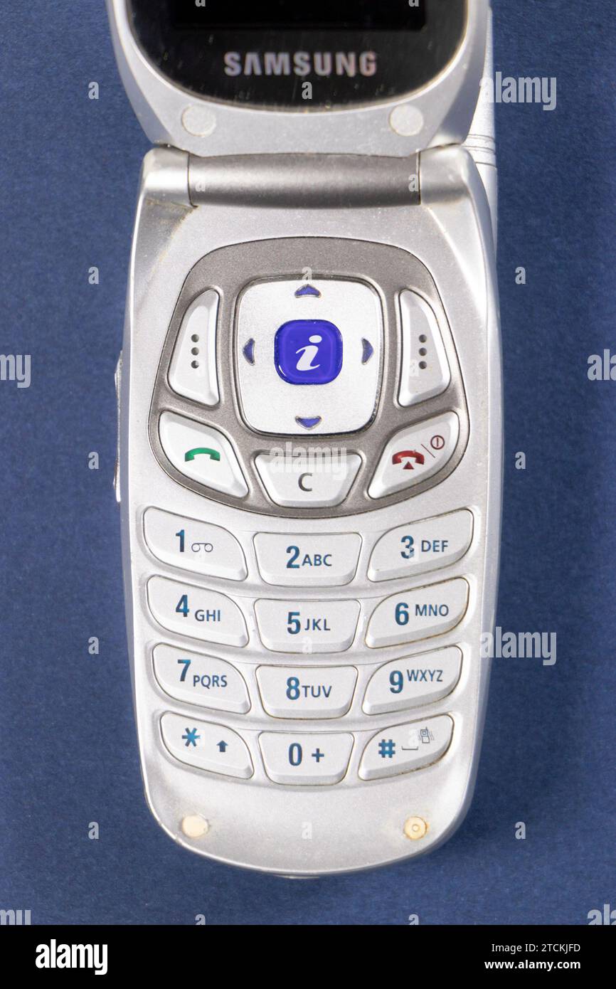 vintage silver samsung Virgin branded flip phone isolated on white ...