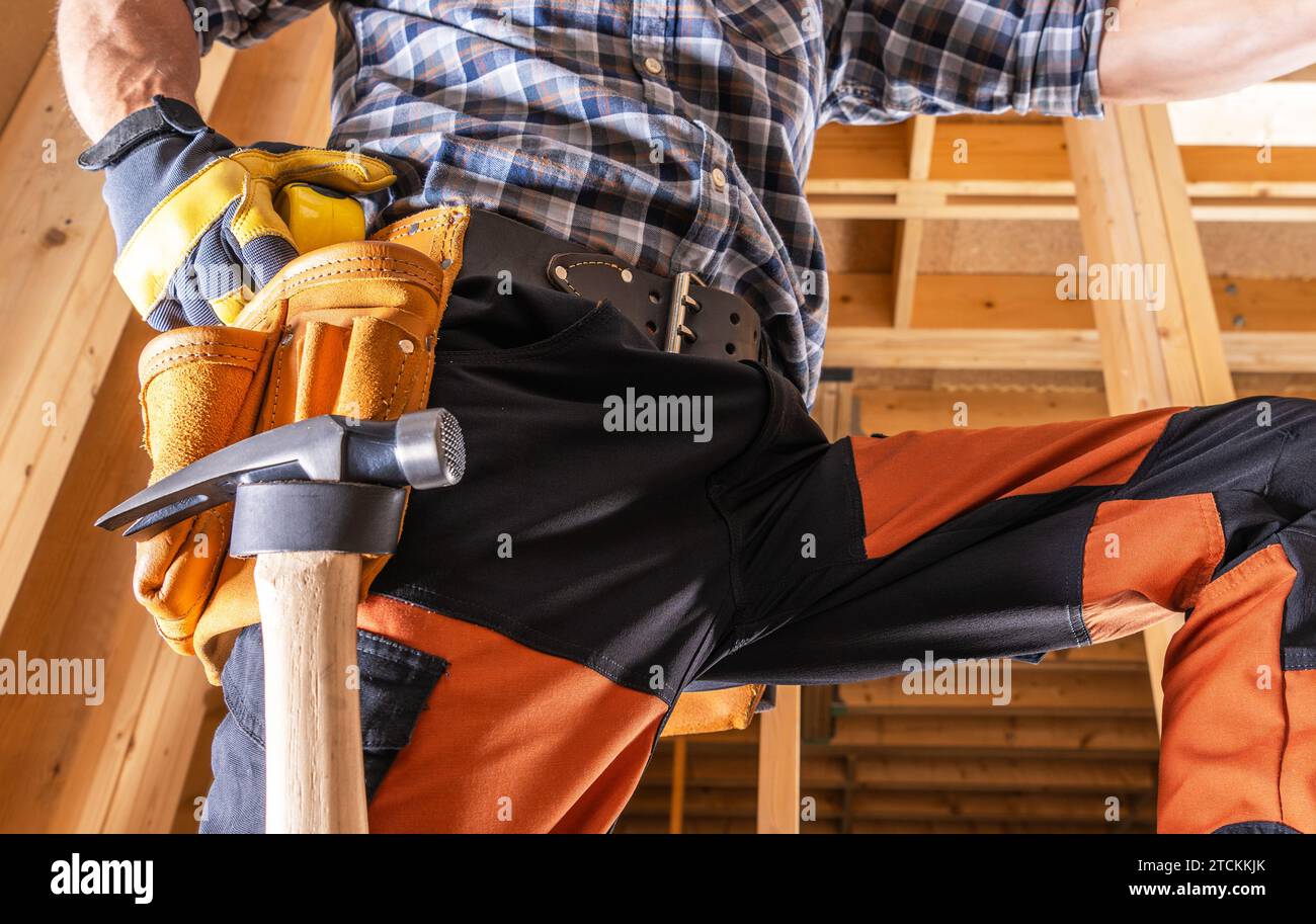 Professional Construction Site Worker Tools Belt with a Hammer Close Up ...